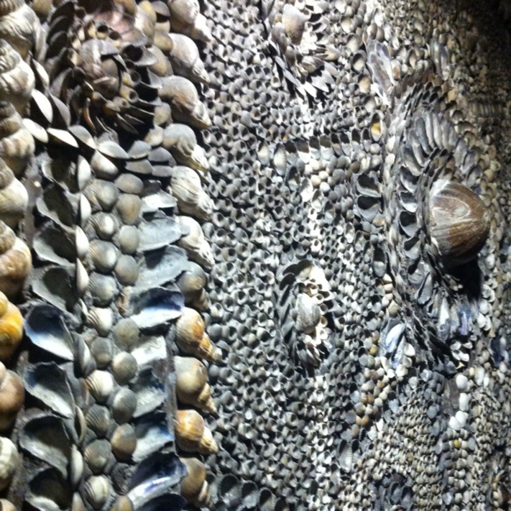The Shell Grotto (UK) is a subterranean passageway with walls decorated ...